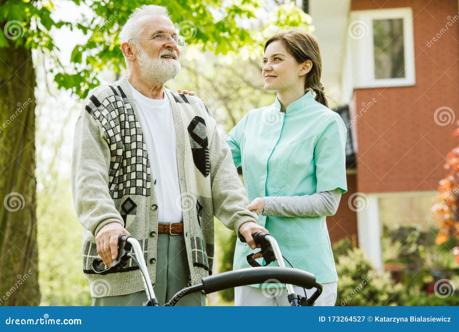 Senior with Walker during Walk in the Park of Modern Nursing Home Stock ...