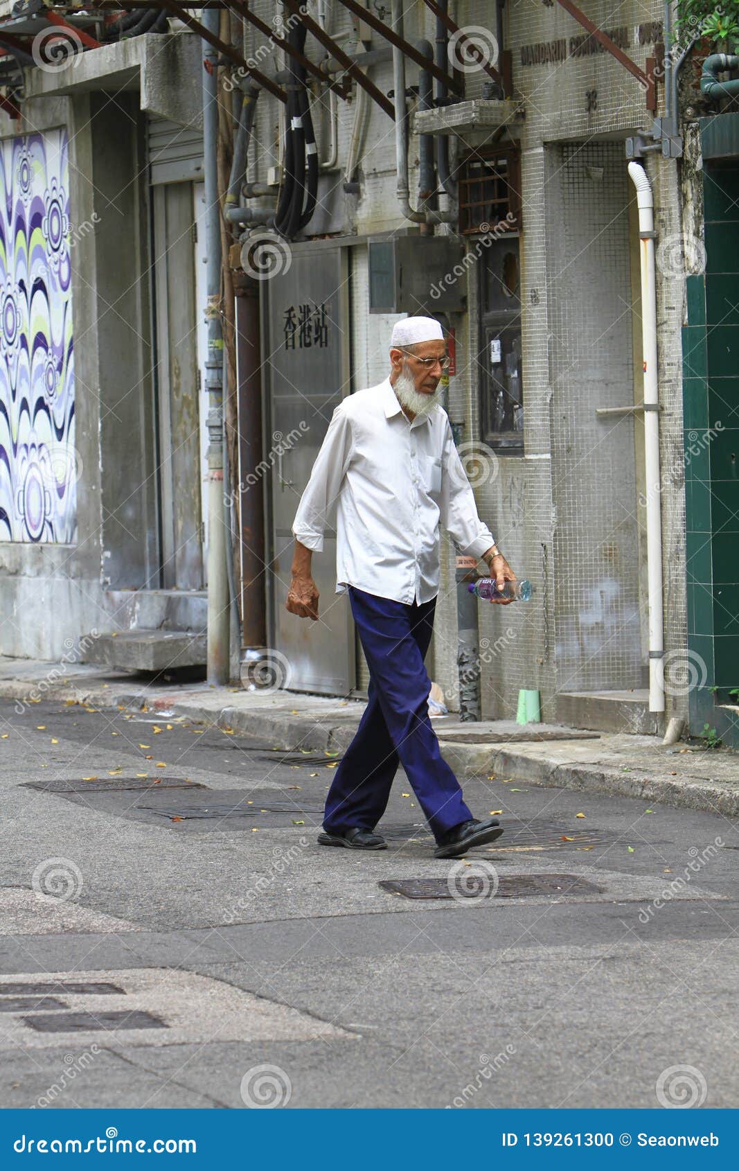 A Senior Man Walking Outdoors on a Path Editorial Image - Image of ...