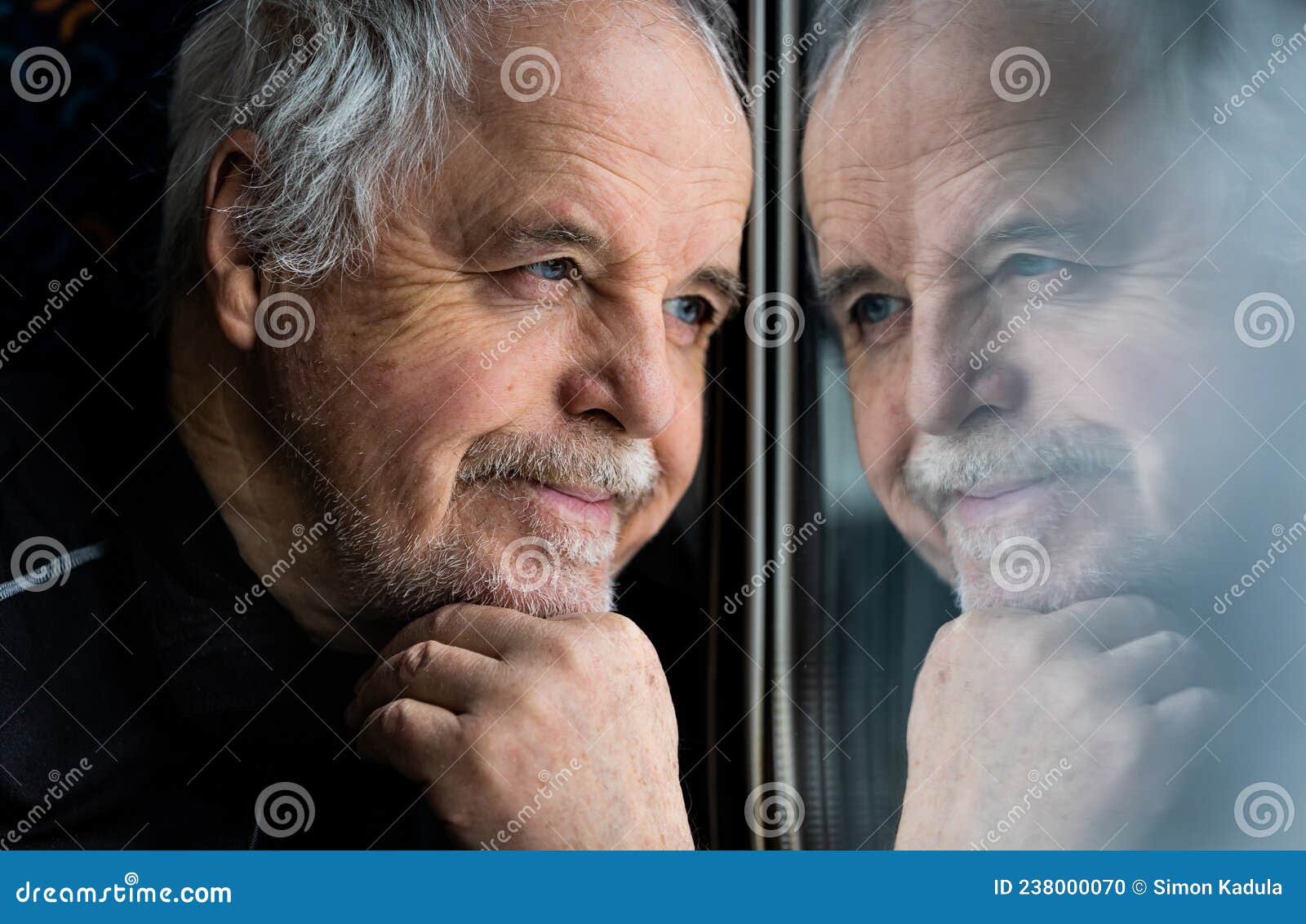 Senior Man Watching Out of the Window, Reflection in the Window ...