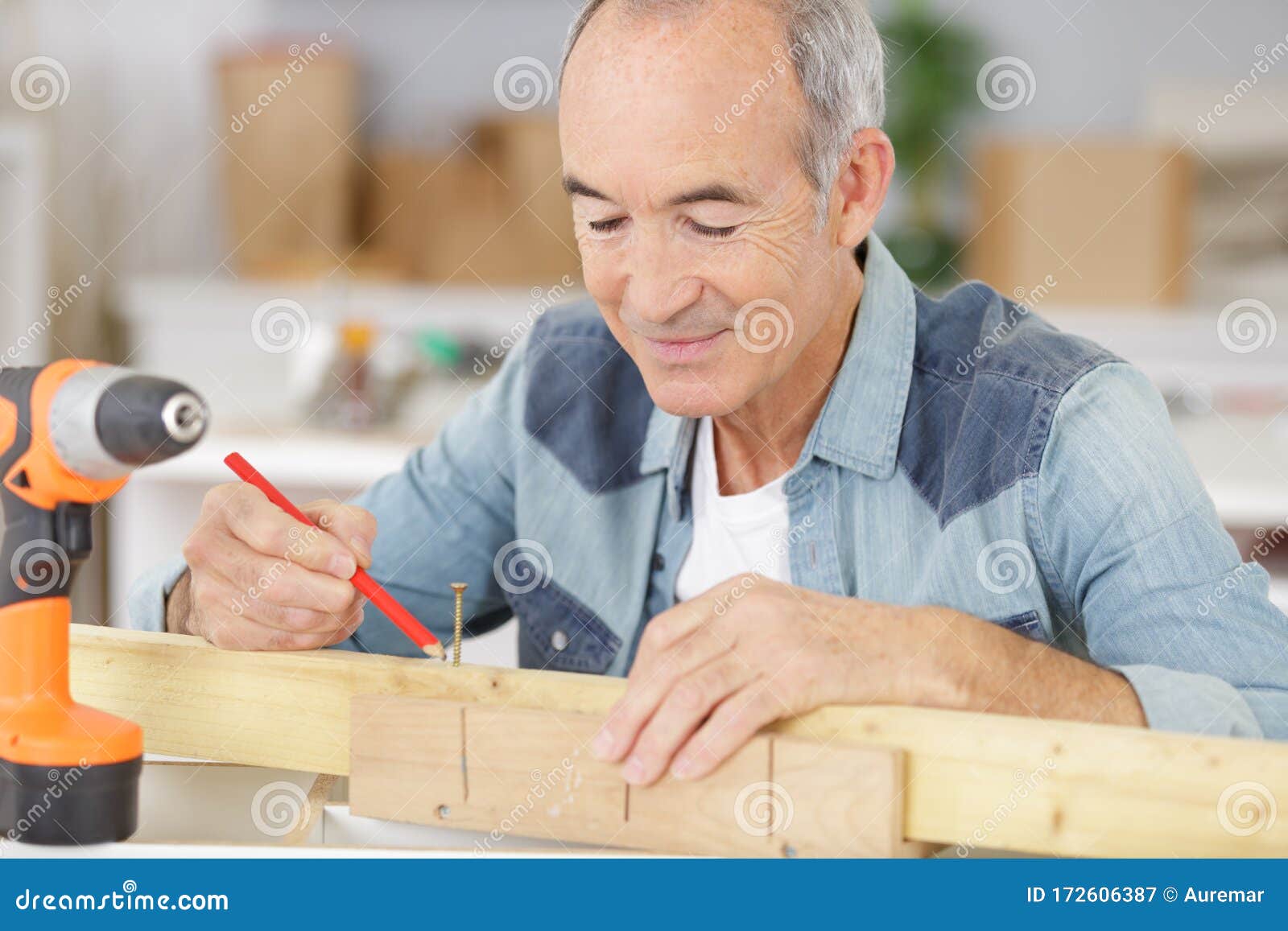 Senior Man Woodworking with Accuracy at Carpentry Workshop Stock Image ...