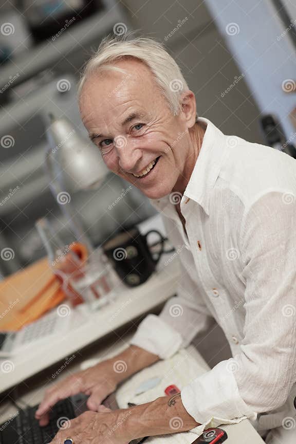 Senior Man Working on His Laptop Computer Stock Photo - Image of hair ...