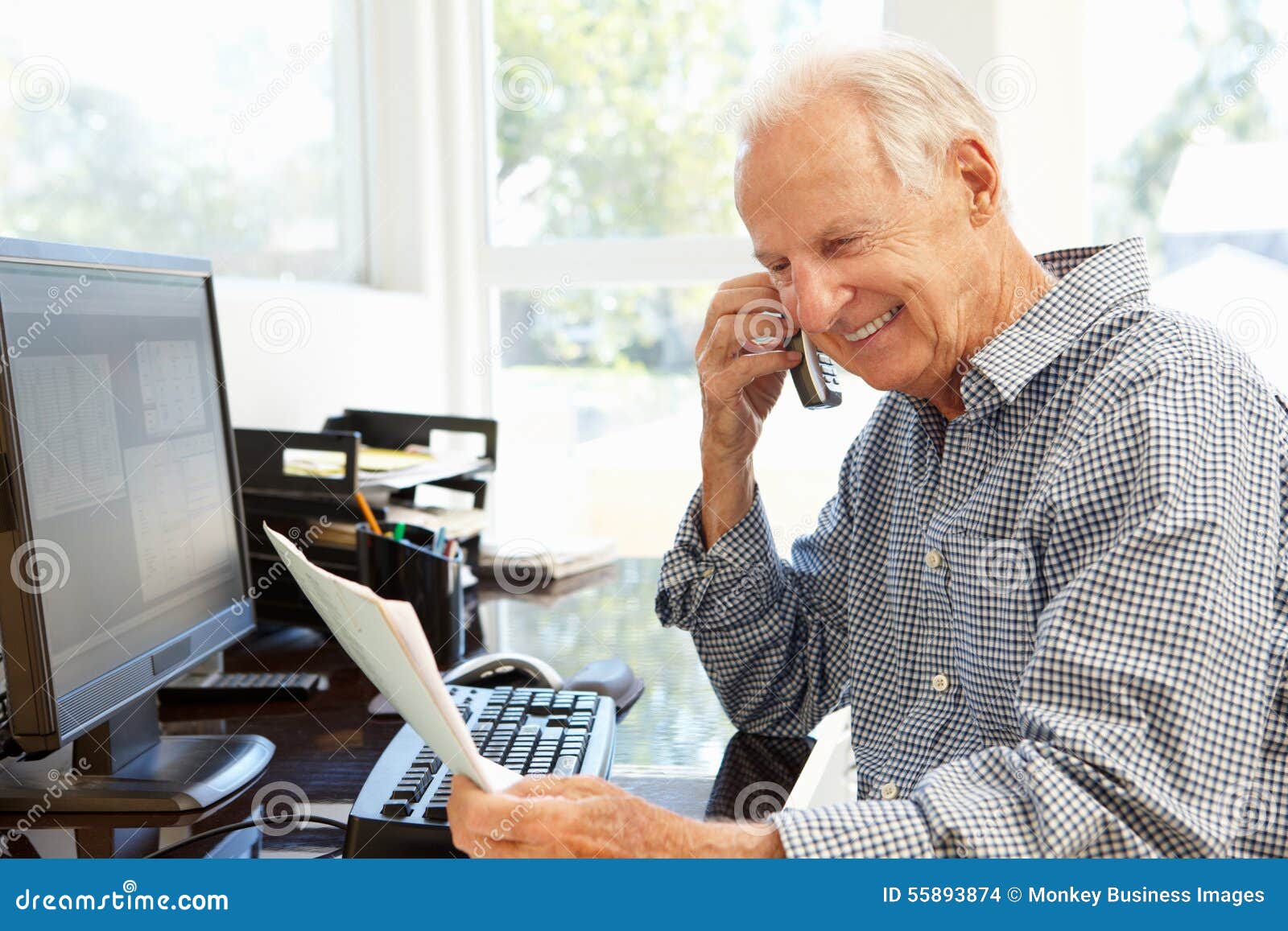 Senior man working at home stock photo. Image of office - 55893874