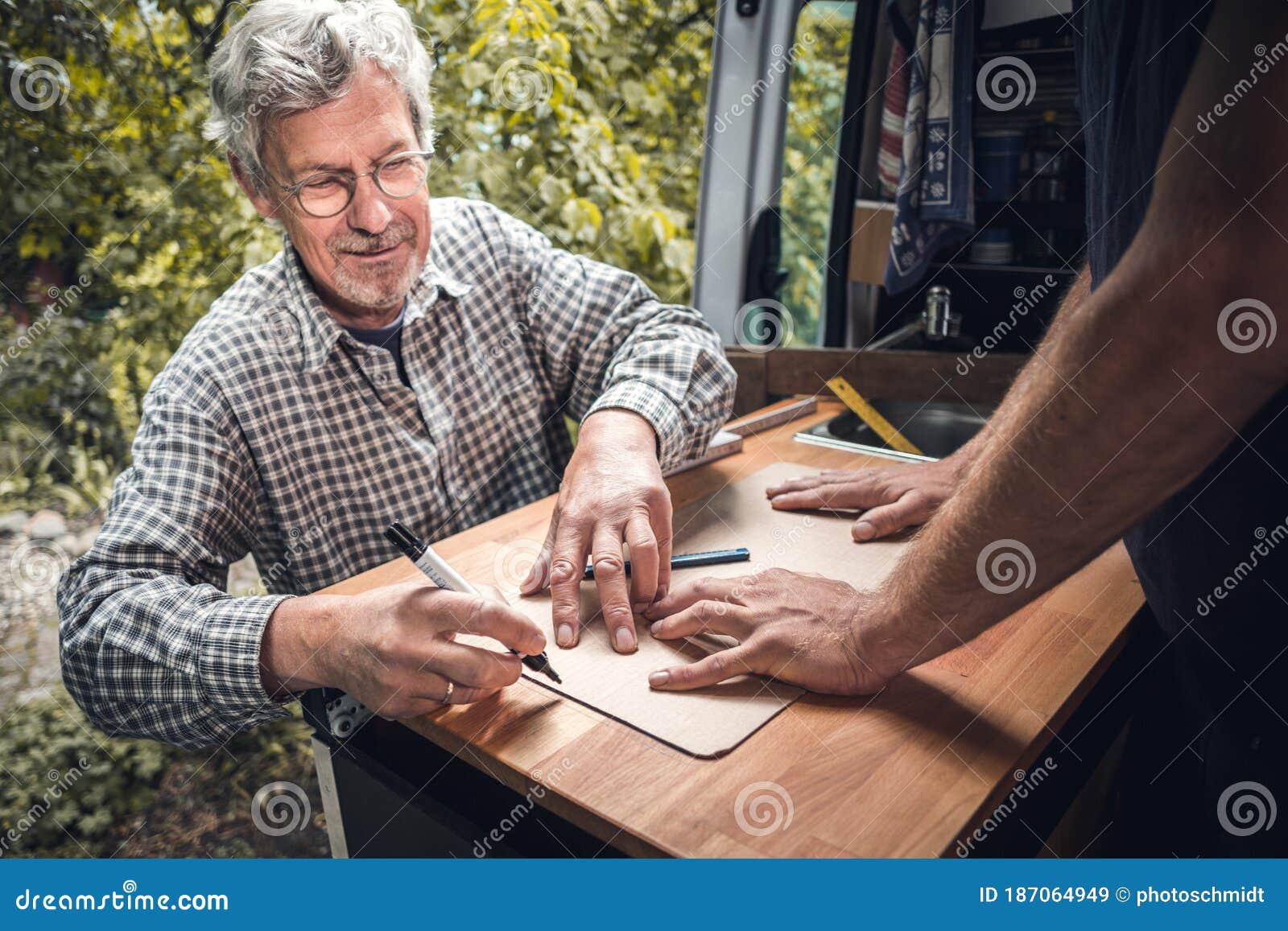 Senior Man Working on the Interior of a Caravan Stock Image - Image of ...
