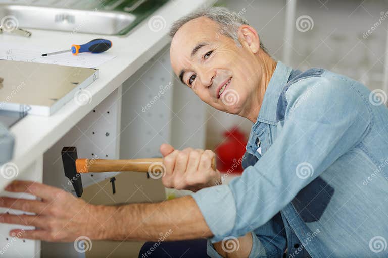 Senior Man Working in Kitchen Stock Photo - Image of industry, luxury ...