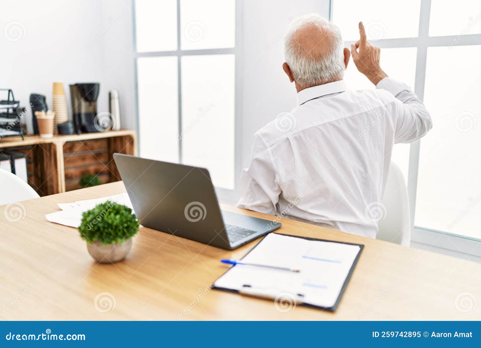 Senior Man Working at the Office Using Computer Laptop Posing Backwards ...