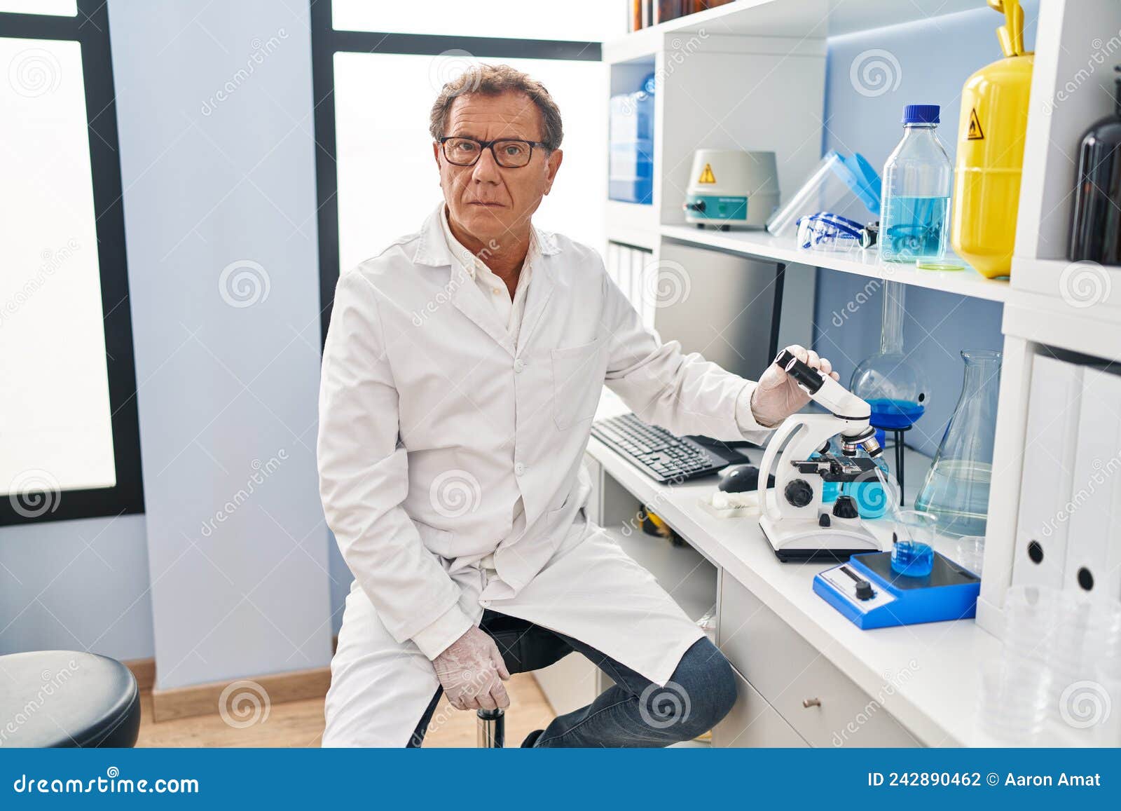 Senior Man Working at Scientist Laboratory Thinking Attitude and Sober ...