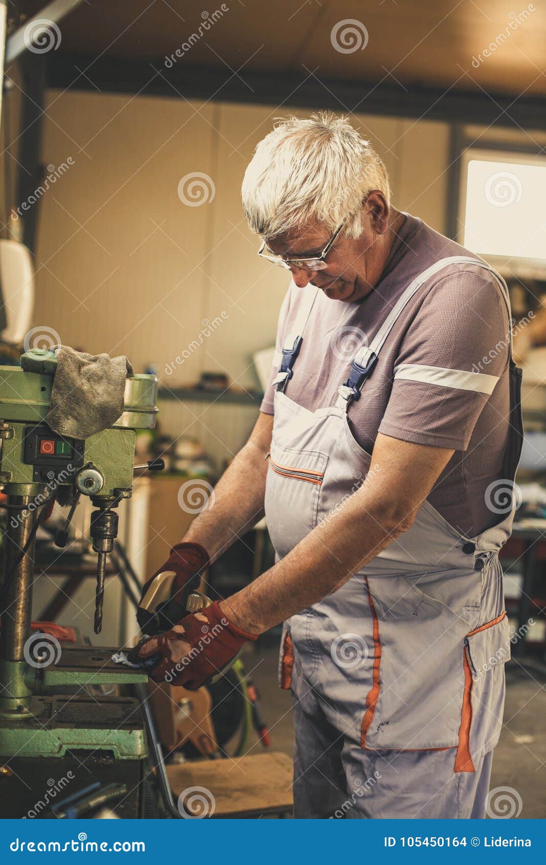 Senior Man in Workshop. Senior Man Working in Workshop Stock Photo ...