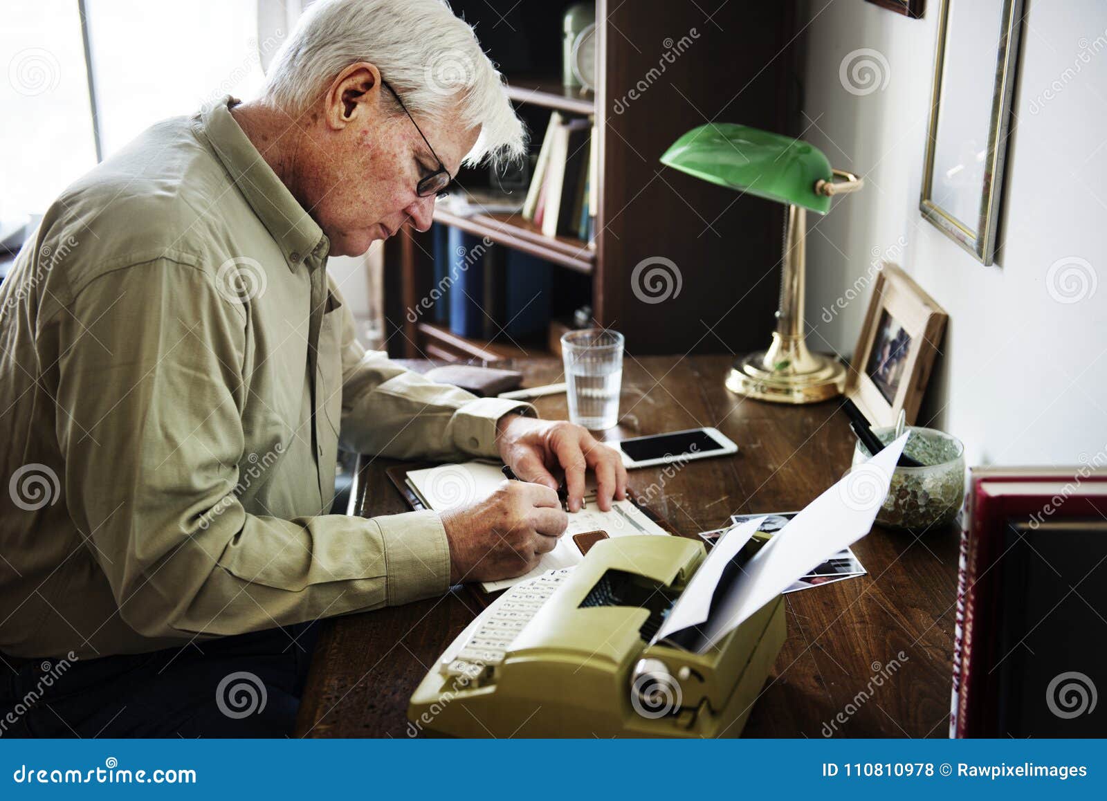 Senior Man Writing on Typewriter Stock Photo - Image of mature ...