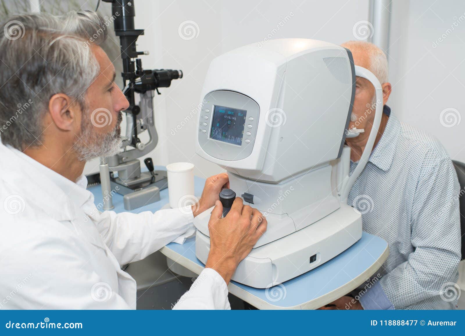 Senior man having eye test stock image. Image of exam - 118888477