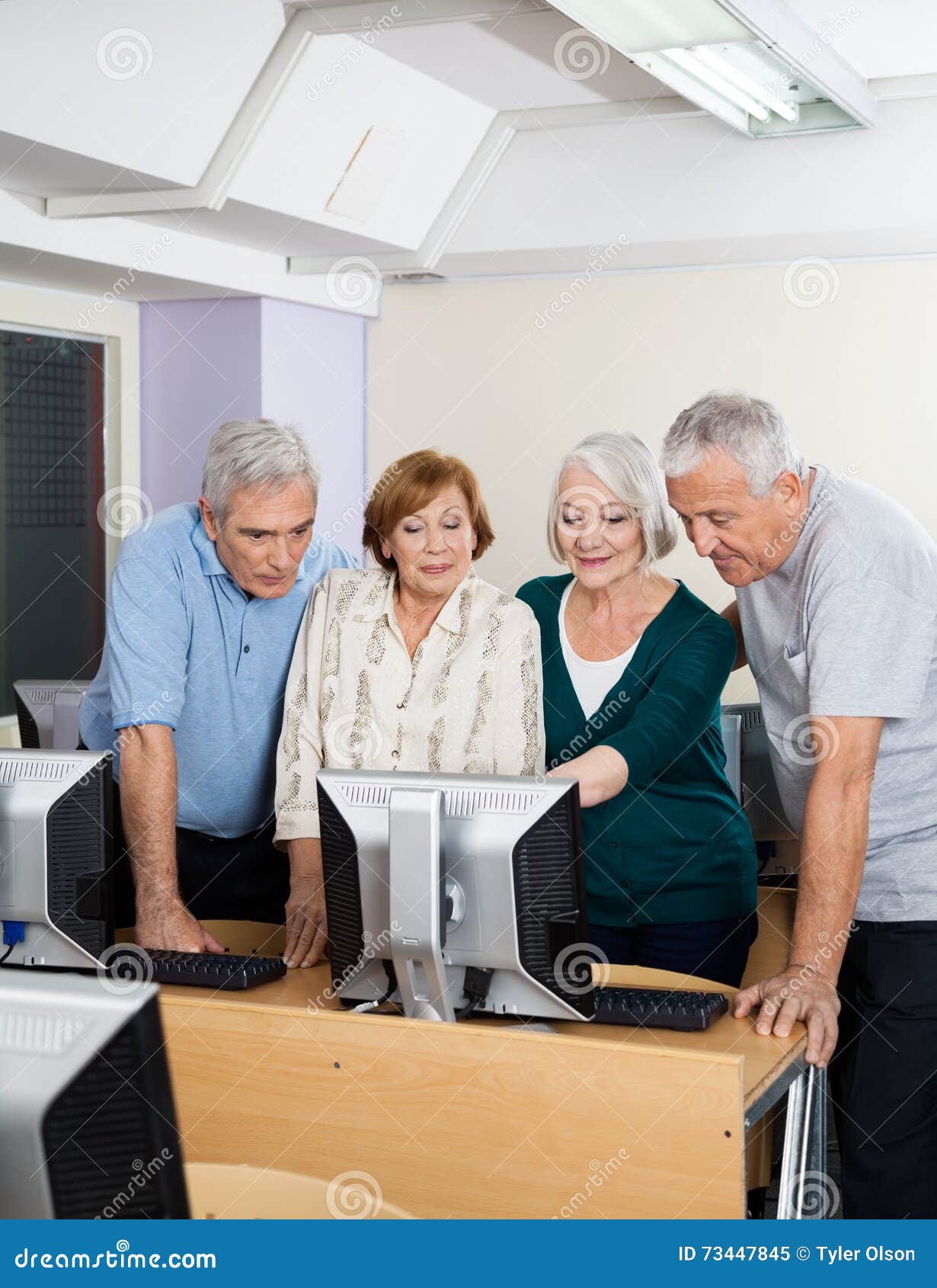 Senior Men And Women Using Computer In Class Stock Image Image Of
