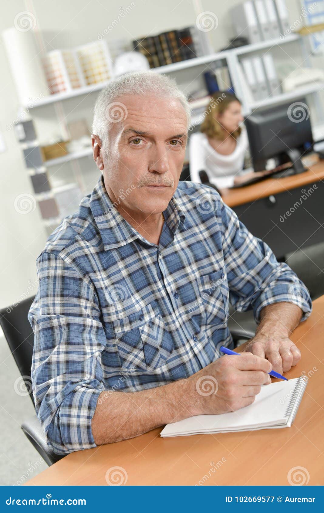 Senior man writing at desk stock image. Image of blank - 102669577