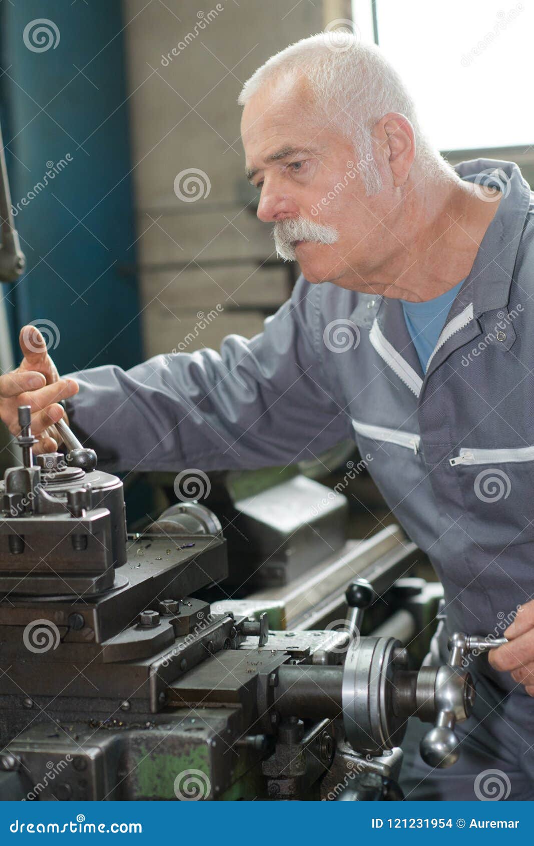 Senior Metal Worker Using Machine in Workshop Stock Photo - Image of ...