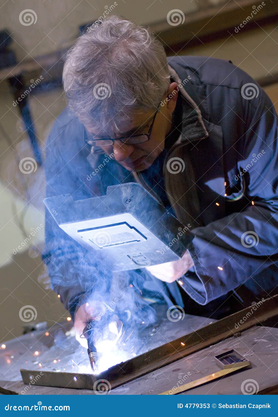 Senior metalworker welding stock image. Image of spectacles - 4779353