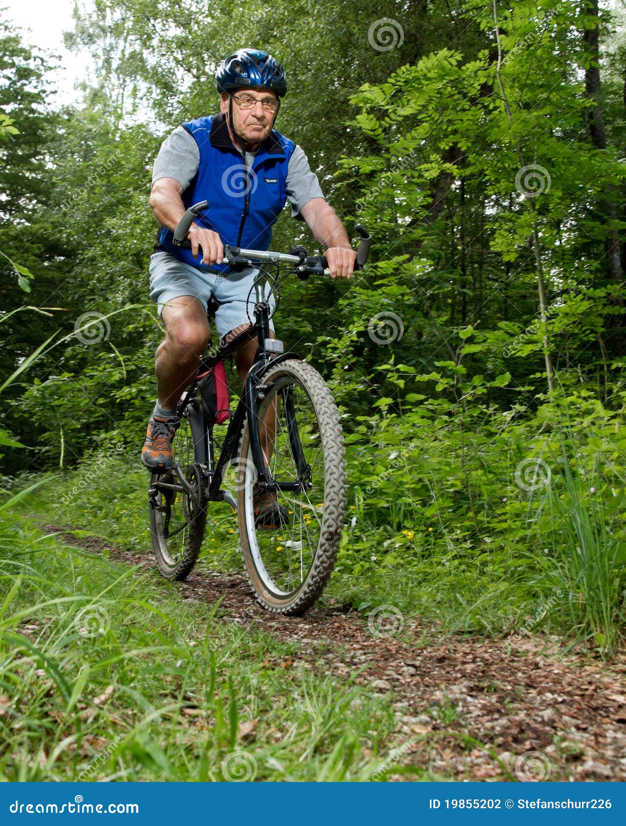 Senior on a mountainbike stock photo. Image of leisure - 19855202