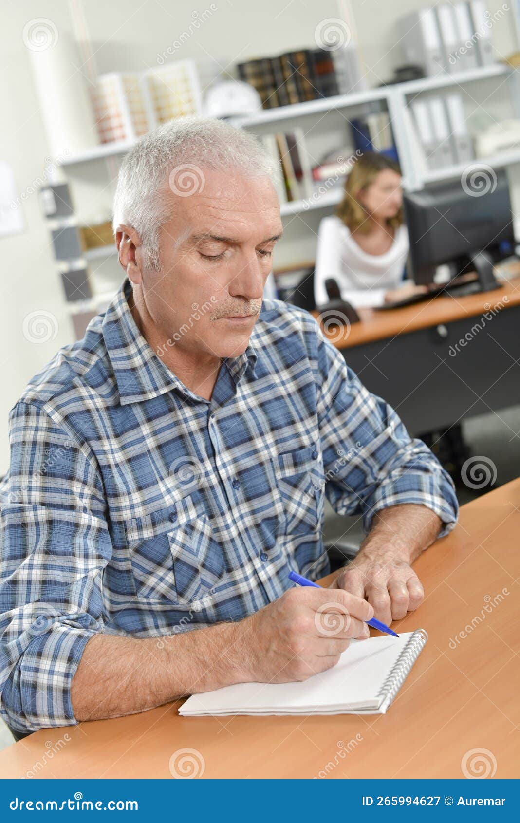 Senior Office Worker Taking Notes Stock Image - Image of form, material ...