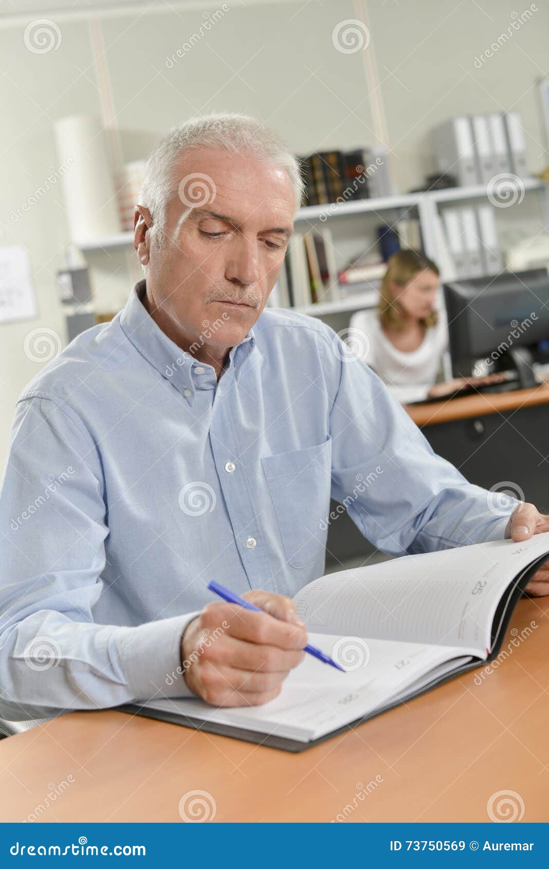 Senior Office Worker Writing in Diary Stock Image - Image of organise ...