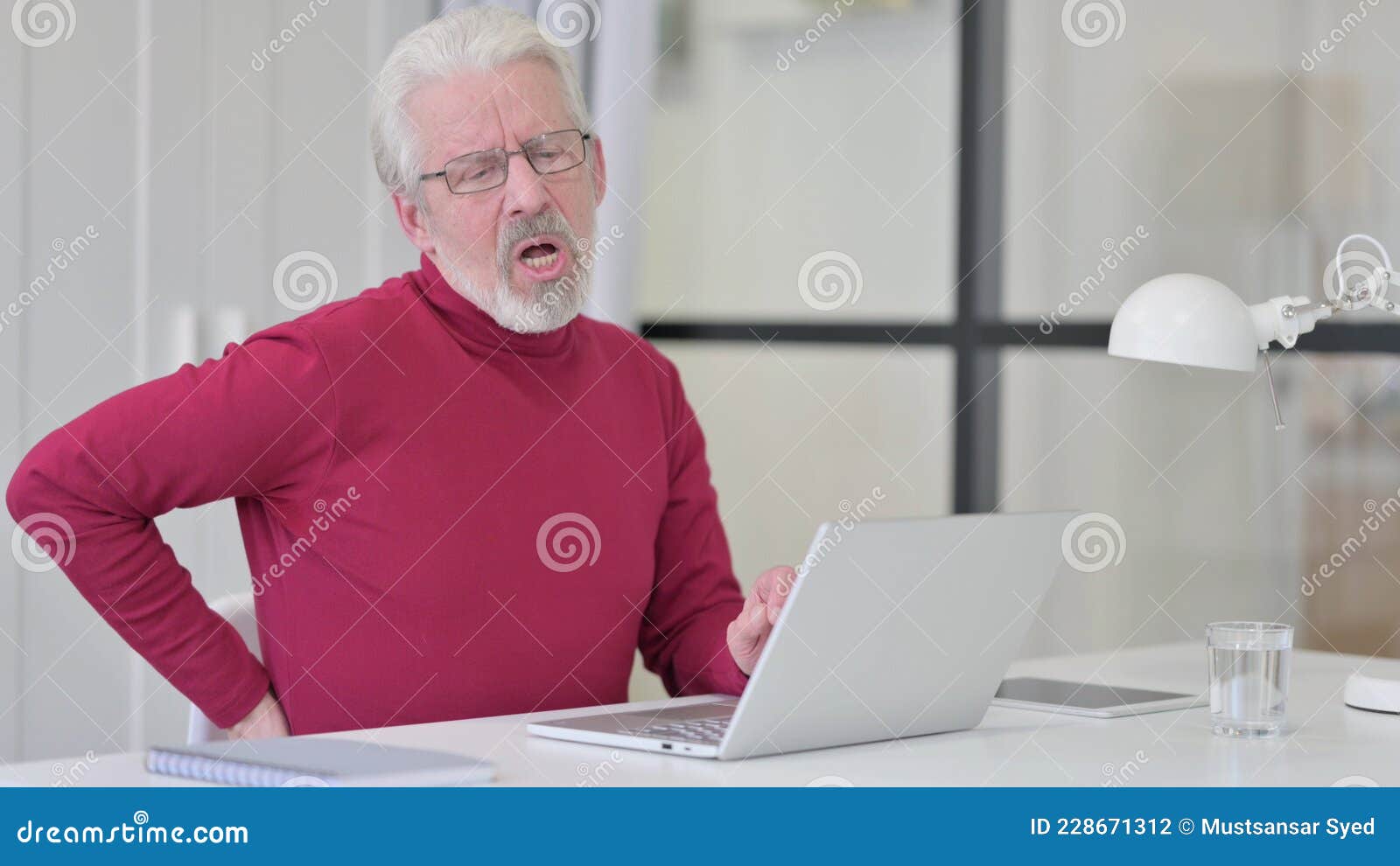Old Man Having Back Pain while Working on Laptop Stock Photo - Image of ...