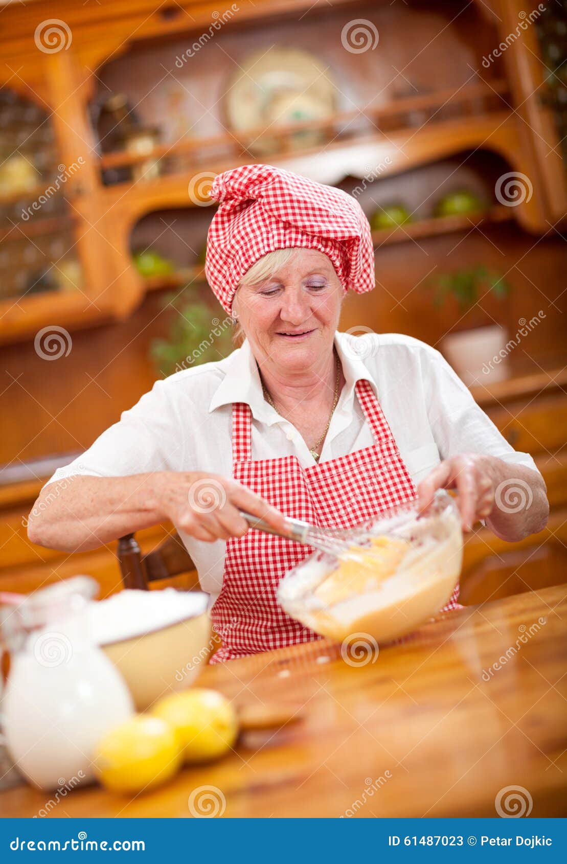Senior or Older Woman Cooking in Kitchen Stock Image - Image of chef ...
