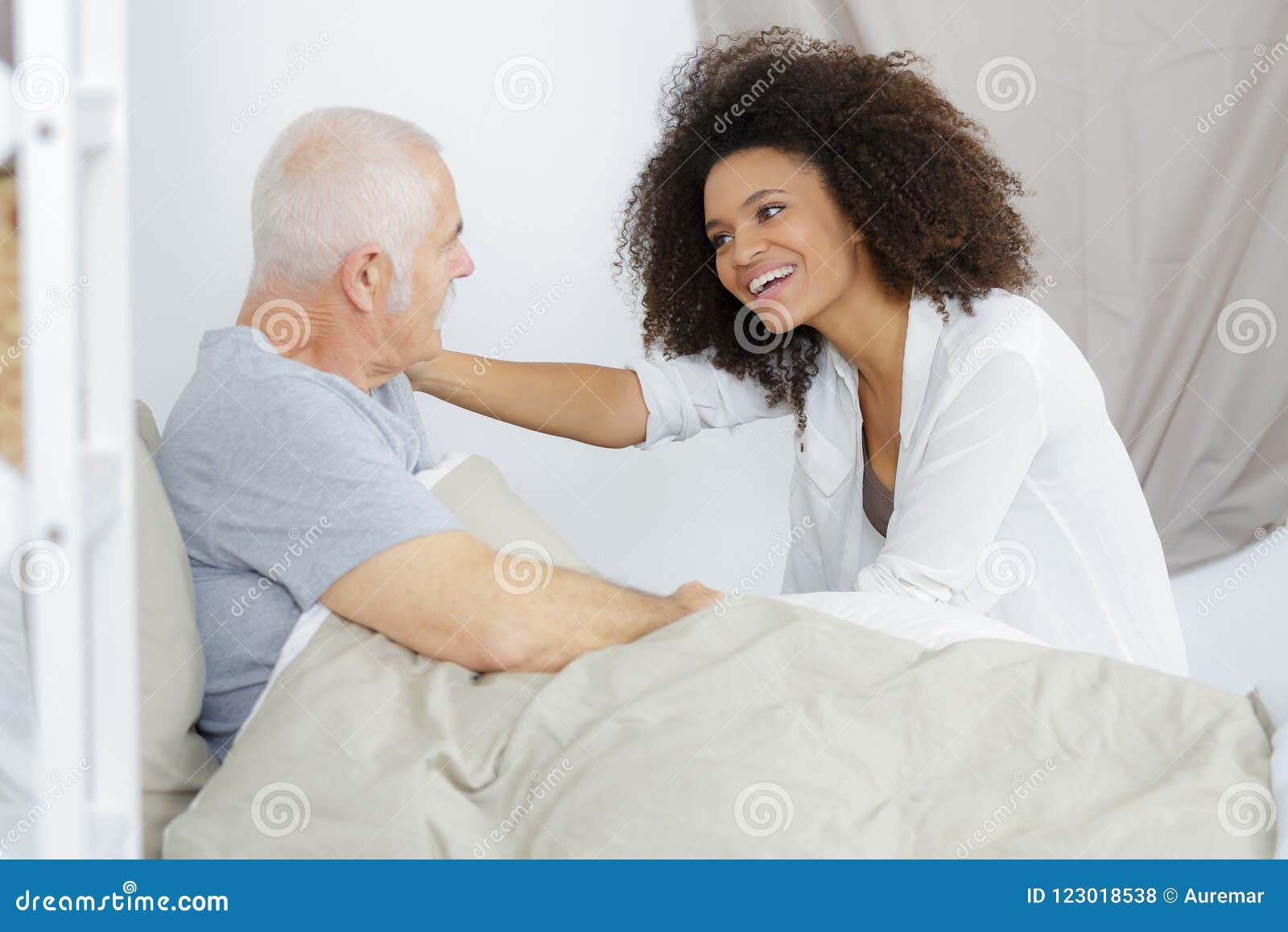 Senior Patient Receiving Help from Female Nurse Stock Photo - Image of ...