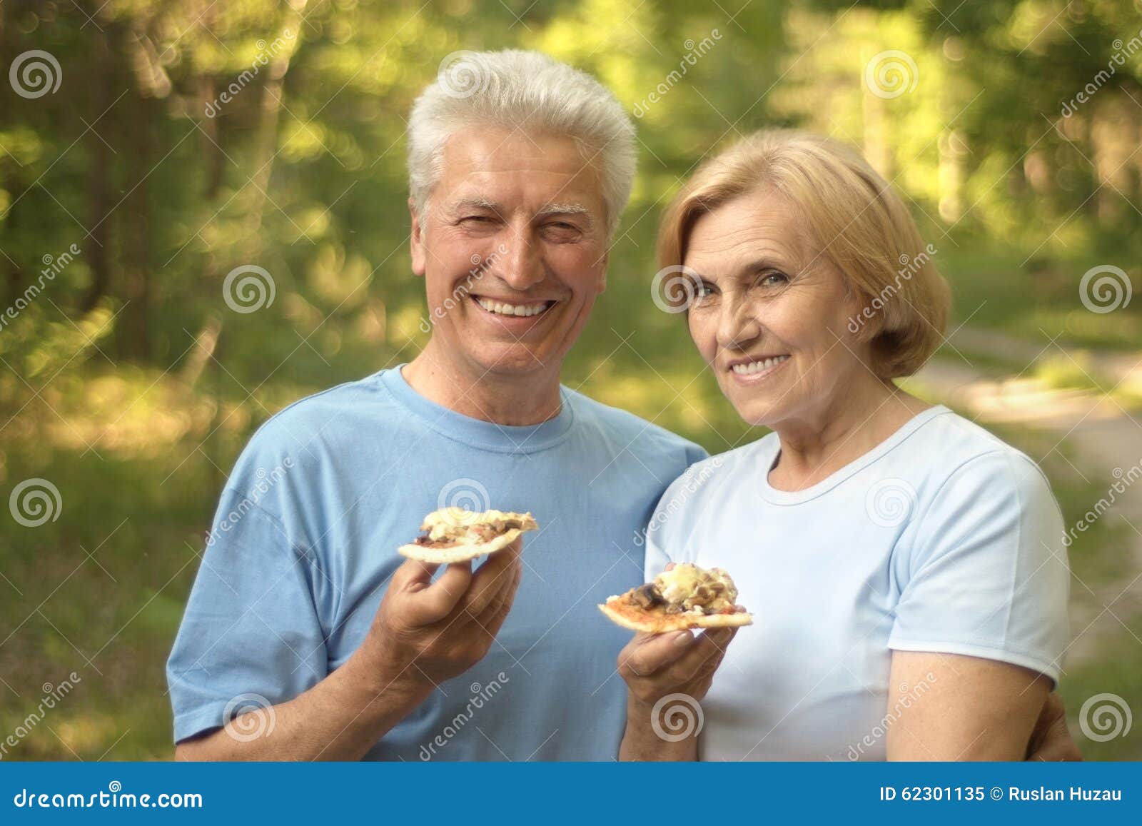 Senior people eating pizza stock image. Image of female - 62301135