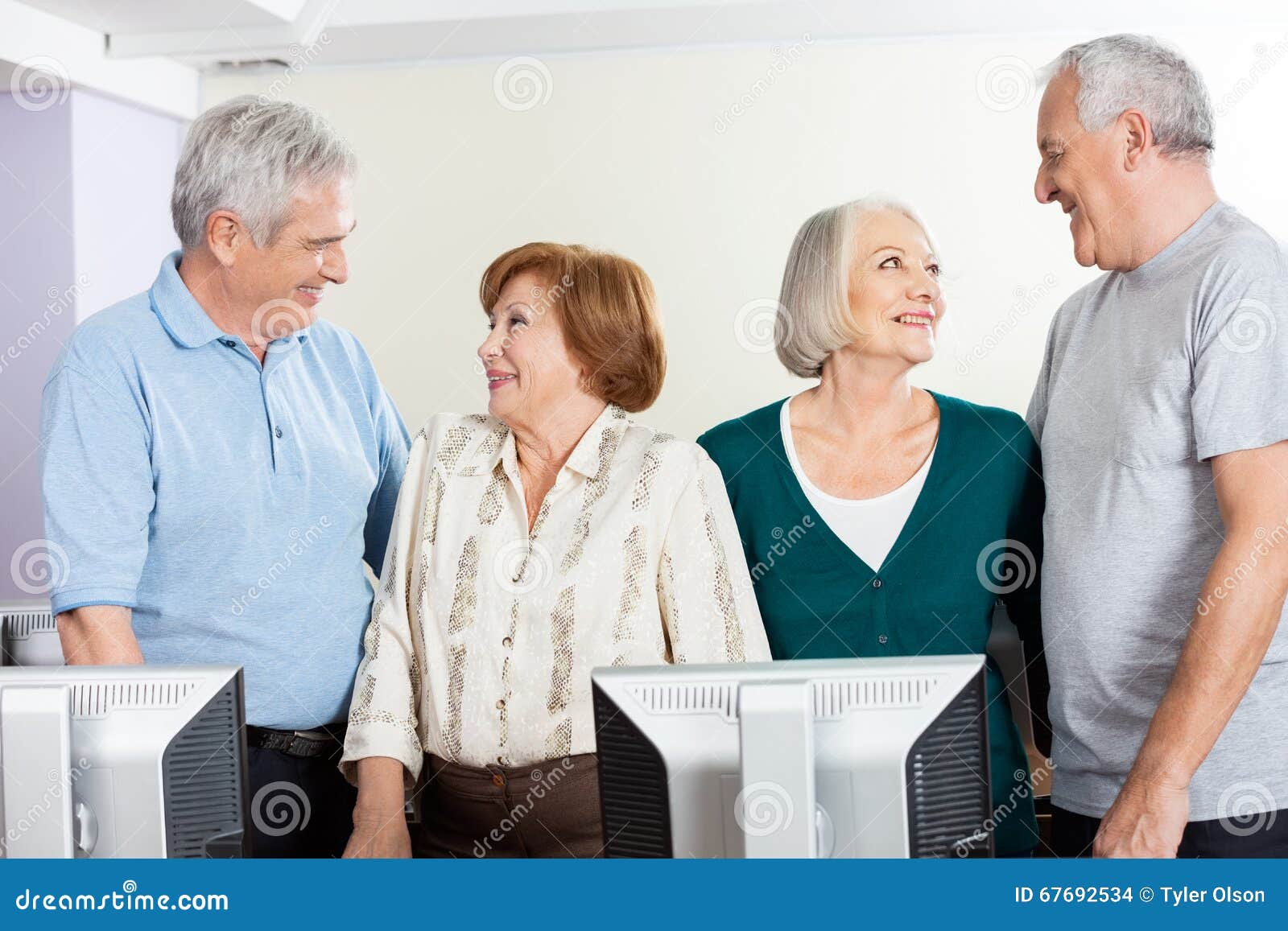 Senior People Looking at Each Other in Computer Class Stock Photo ...