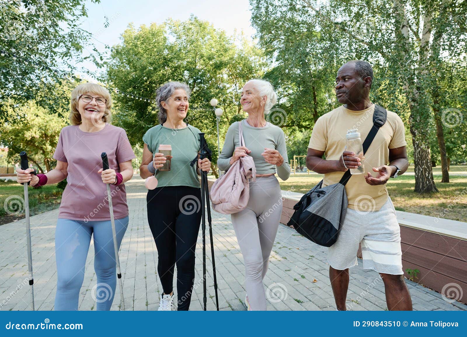 Senior People Walking Together in the Park Stock Photo - Image of ...