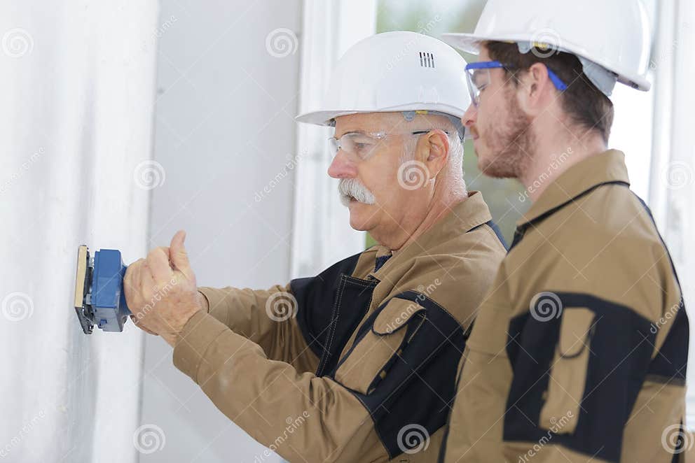 Senior Plasterer Worker in Protective Mask Sanding Wall Stock Photo ...