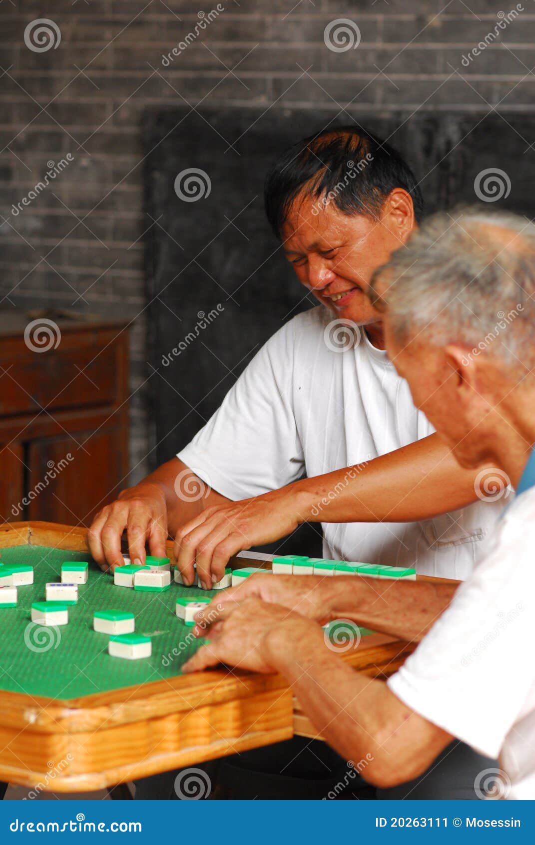 Senior Playing Mahjong Editorial Photo - Image: 20263111