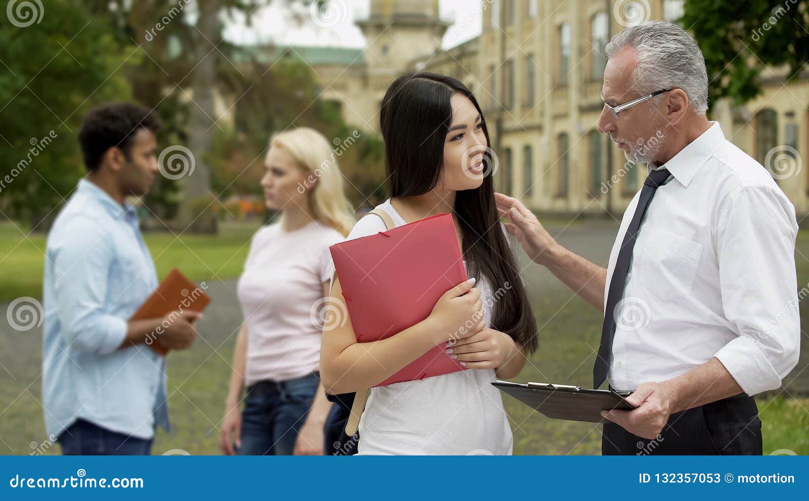 Senior Professor Talking To Asian Student, Discussing Science Project ... Senior Professor Talking To Asian Student, Discussing Science Project ...