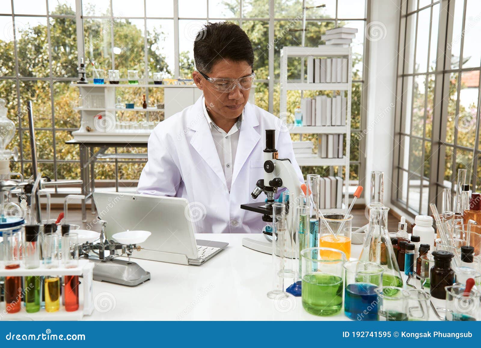 Senior Research Scientist Check Experimental Data from Laptop Stock ...