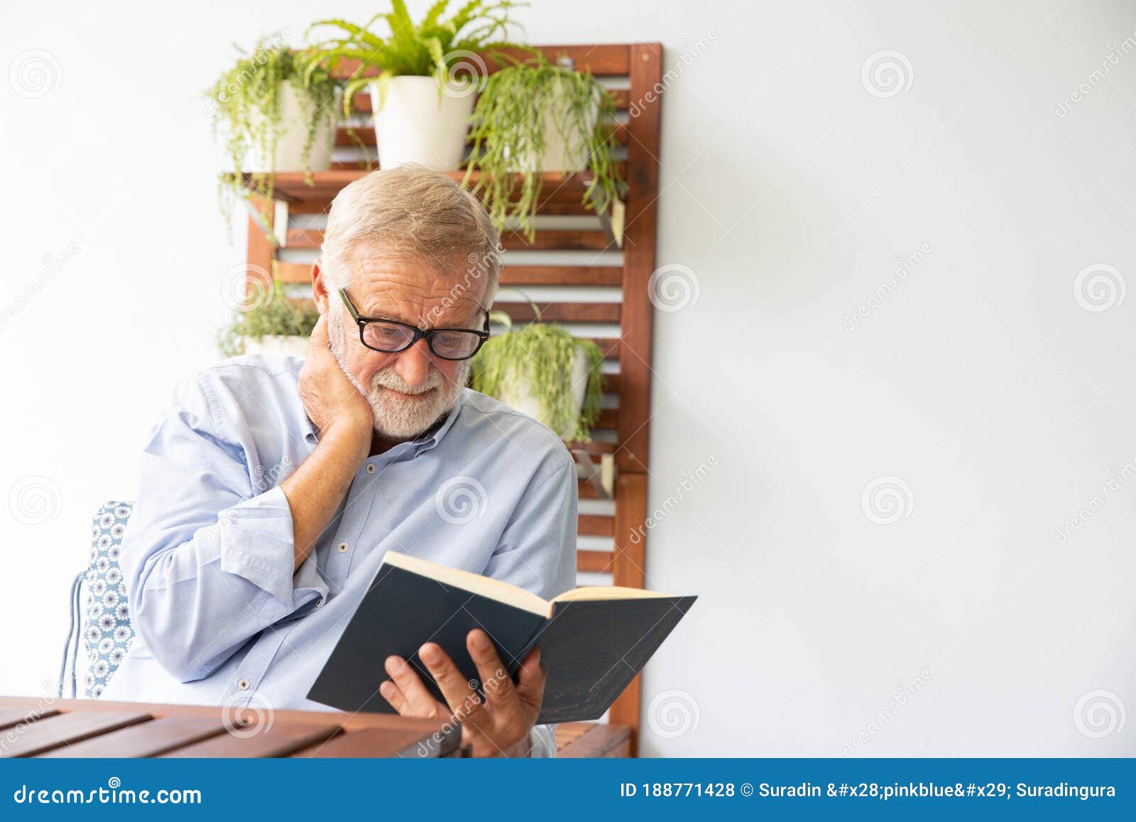Senior Retirement Man Happy Reading Book at Home Stock Photo - Image of ...