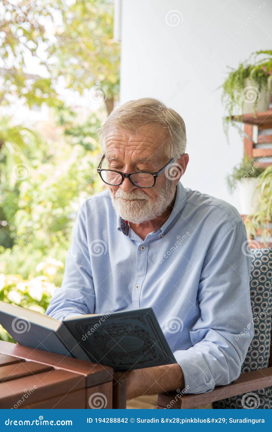 Senior Retirement Man Happy Reading Book at Home Stock Photo - Image of ...