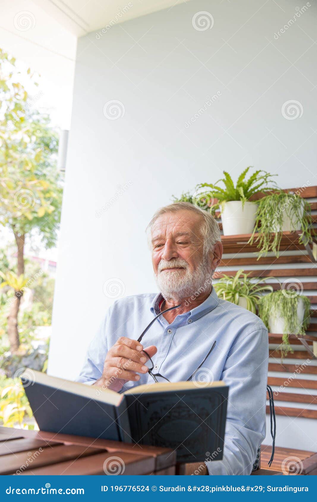 Senior Retirement Man Happy Reading Book at Home Stock Photo - Image of ...