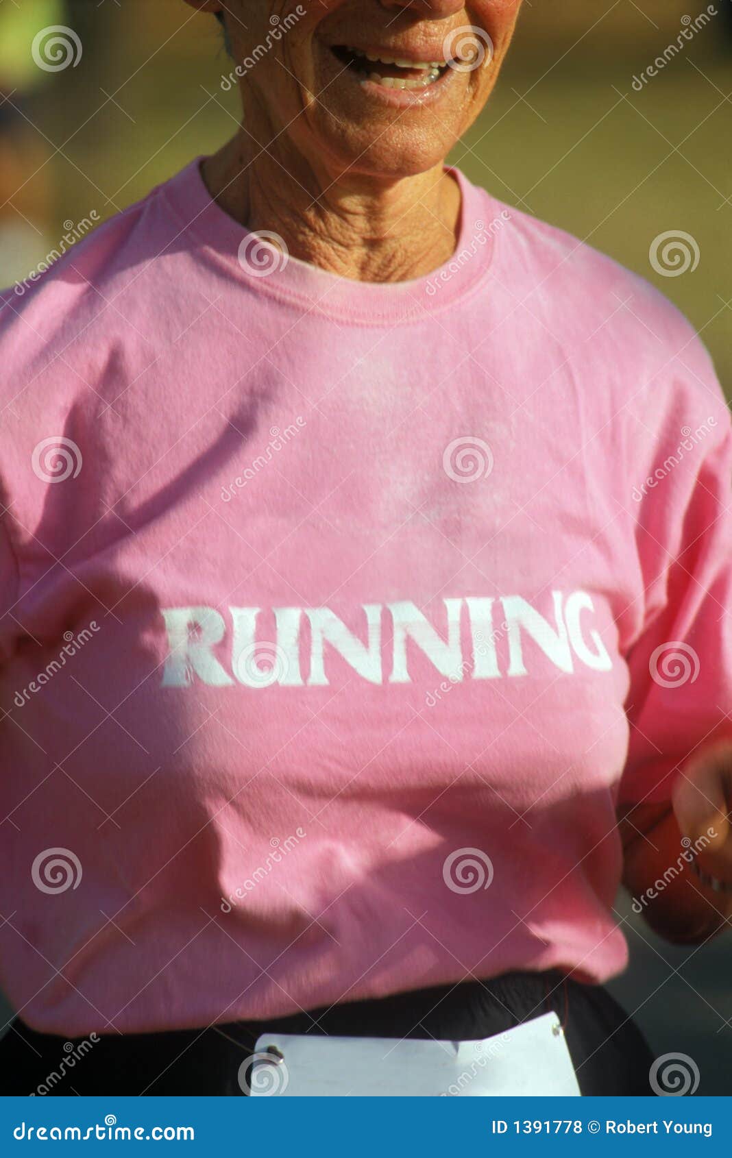 Senior Runner at the End of a Race Stock Photo - Image of pink ...