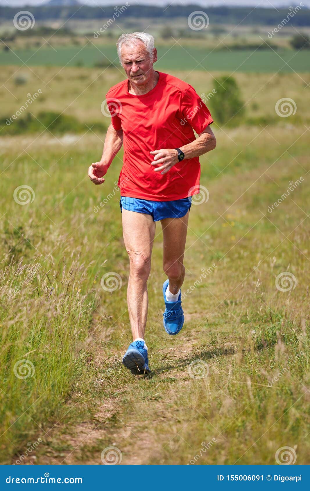 Senior Runner Running on the Meadow Road Stock Image - Image of athlete ...