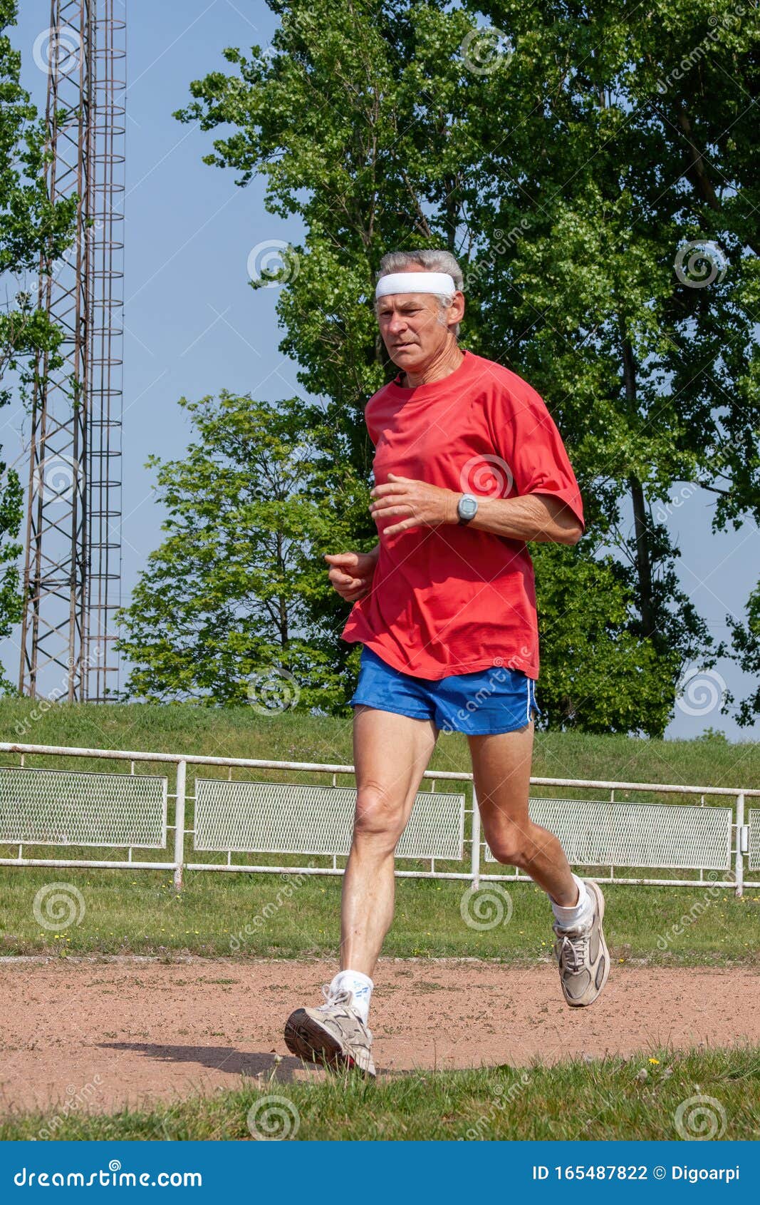 Senior Runner Running on Track and Field Stock Photo - Image of ...