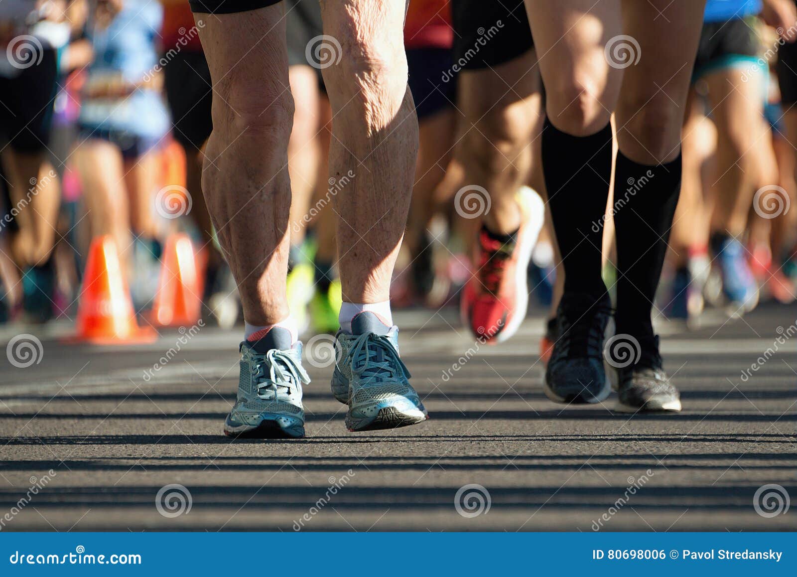 Senior running a marathon stock photo. Image of legs - 80698006