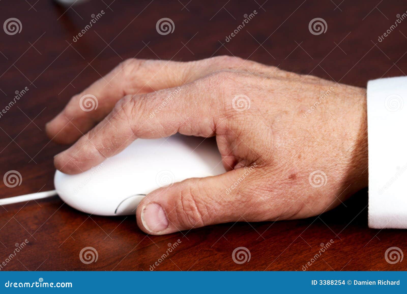 Senior s hand on mouse stock photo. Image of information - 3388254