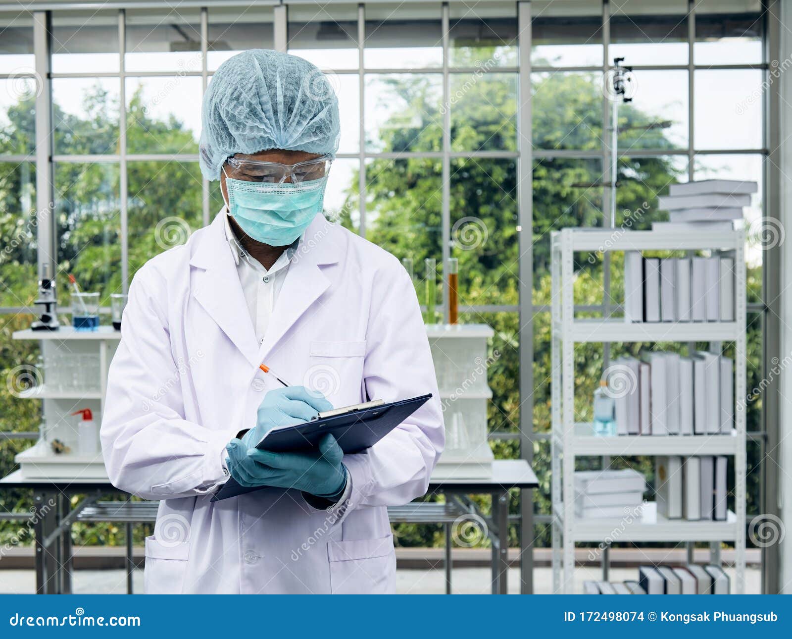 Senior Scientist with Formal Uniform and Working in Laboratory Stock ...