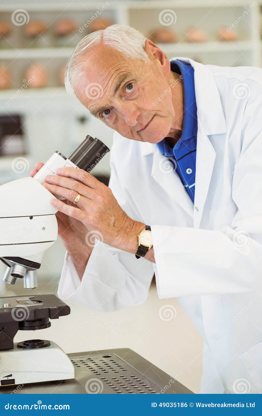 Senior Scientist Working with Microscope Stock Photo - Image of ...