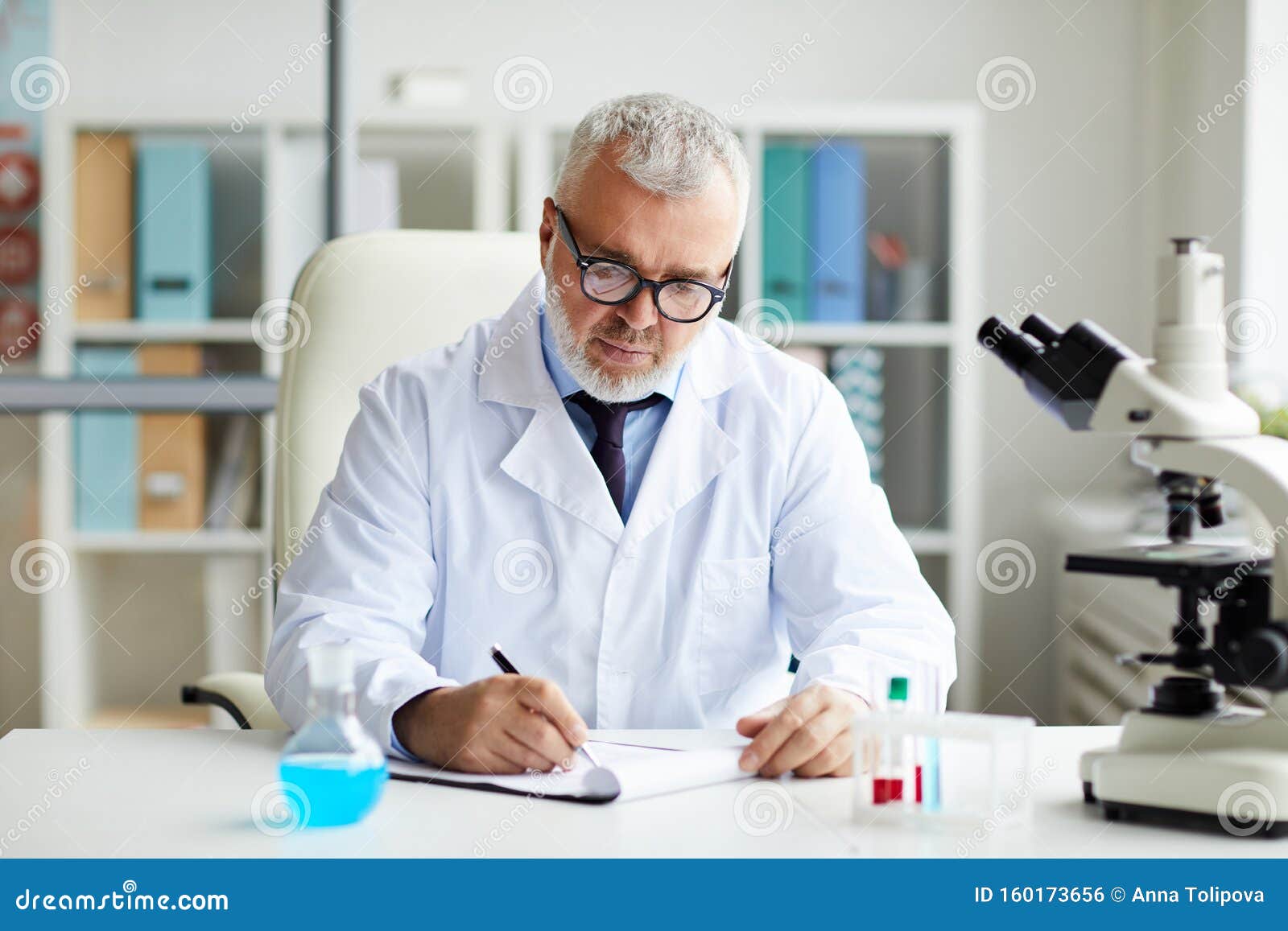 Senior Scientist Working at the Table Stock Photo - Image of people ...