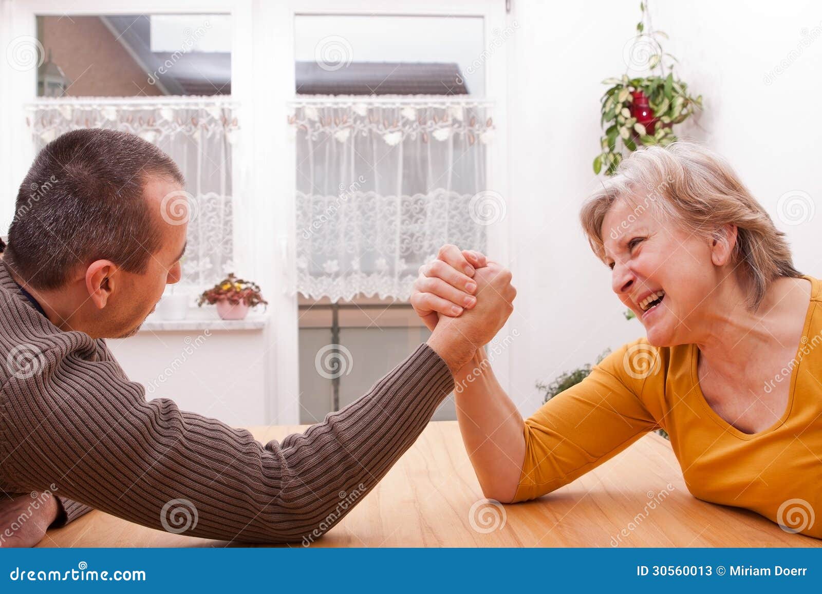 A Senior Showing Their Power Stock Image - Image of generations, family ...