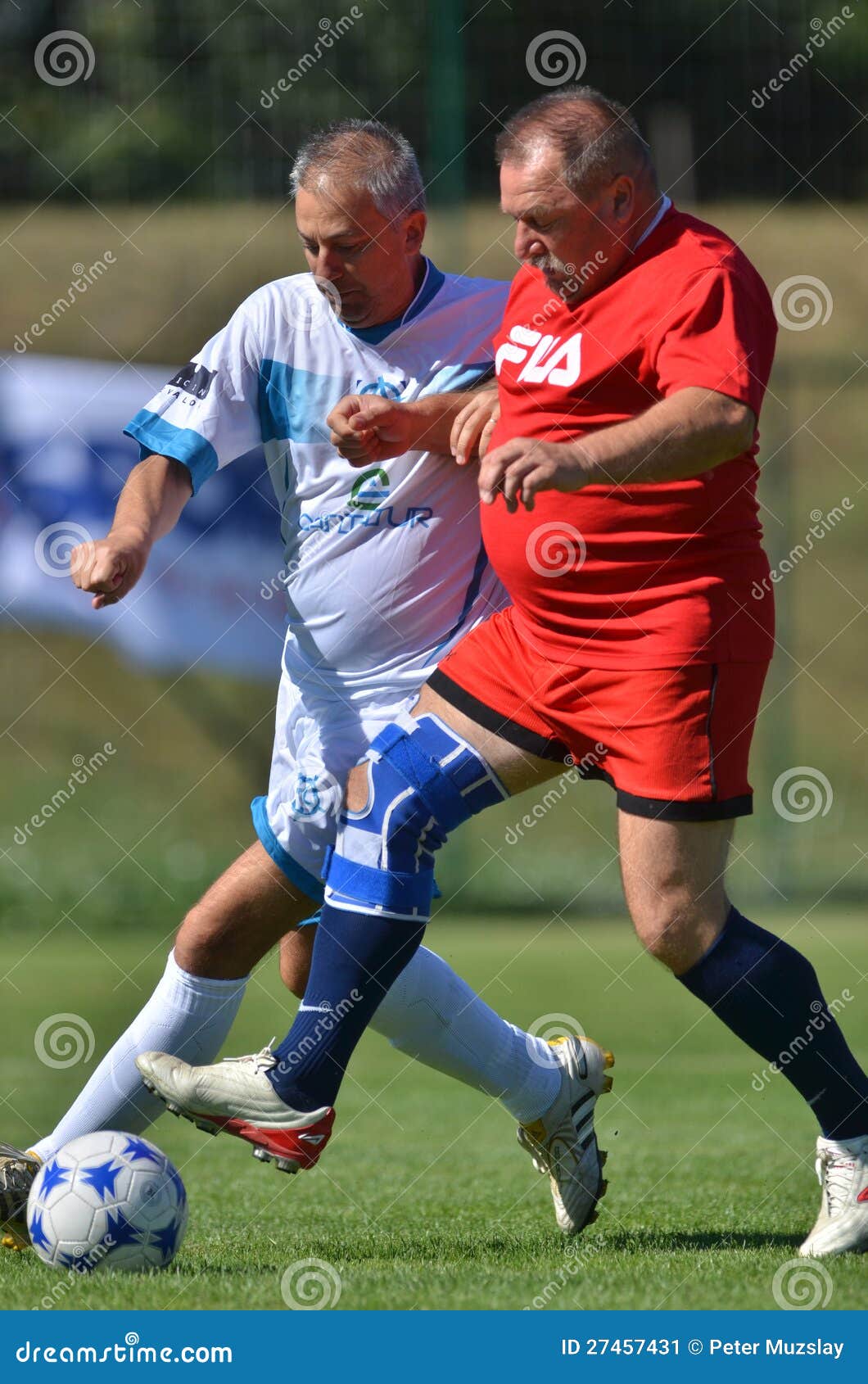 Senior soccer game editorial photo. Image of grass, boys - 27457431