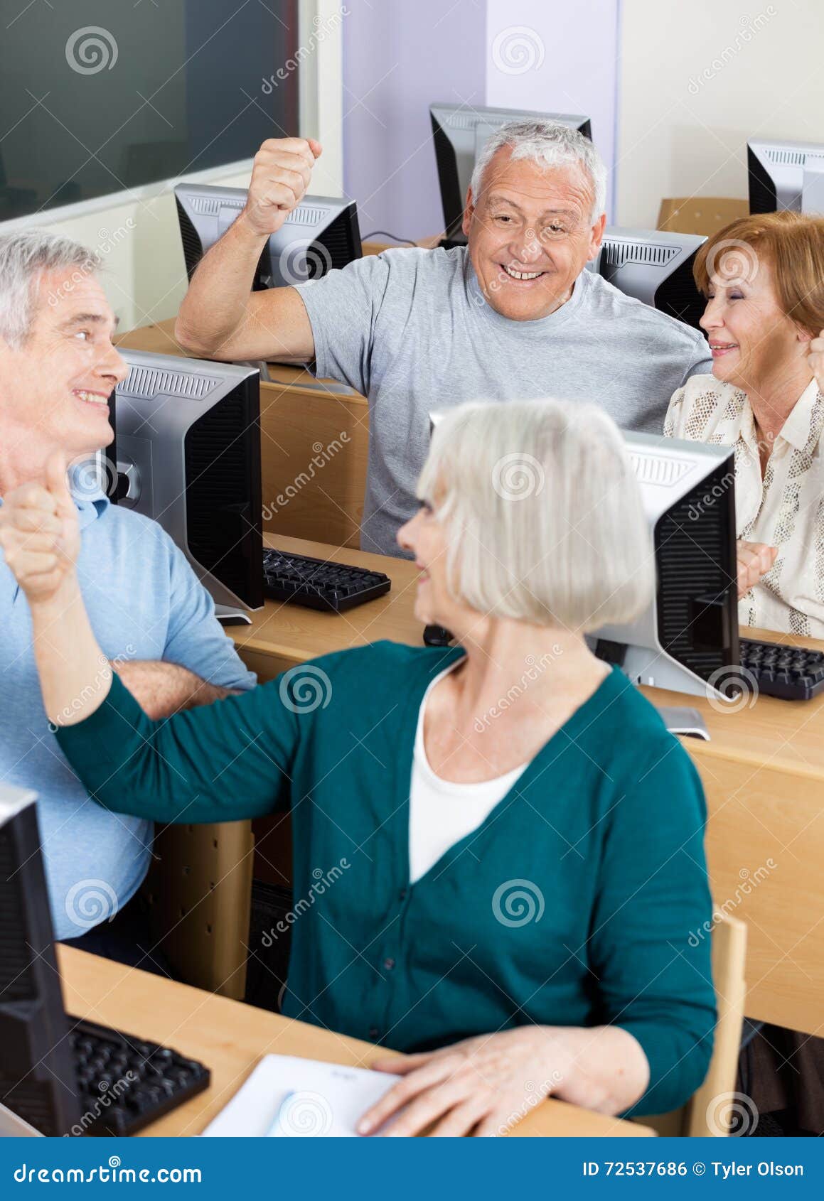 Senior Students Cheering in Computer Class Stock Photo - Image of ...