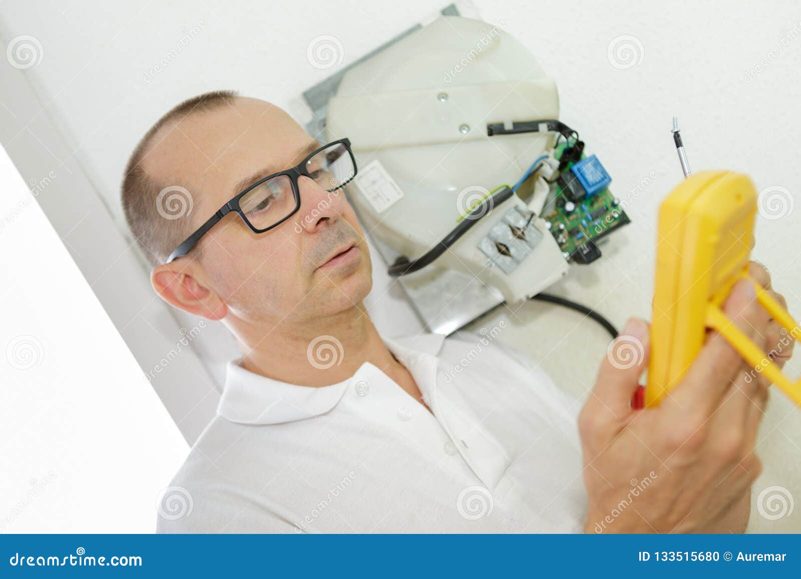 Senior Technician Using Multimeter Stock Photo - Image of instrument ...