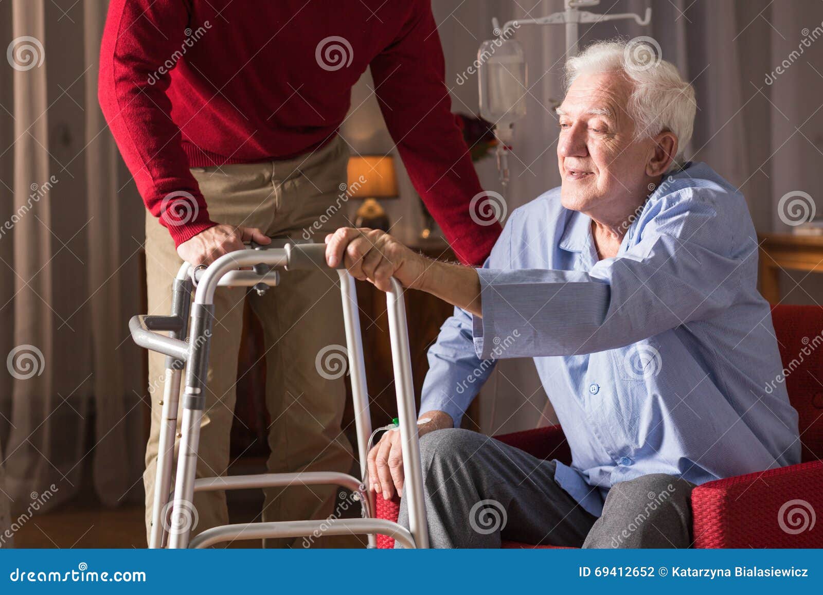 Senior with walking zimmer stock photo. Image of closeness - 69412652