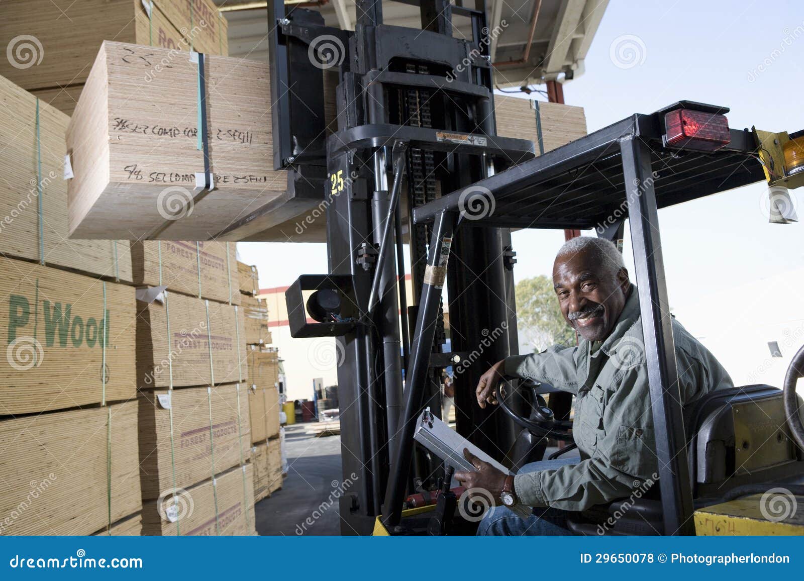 Senior Warehouse Worker Stacking Wood by Forklift Stock Photo - Image ...