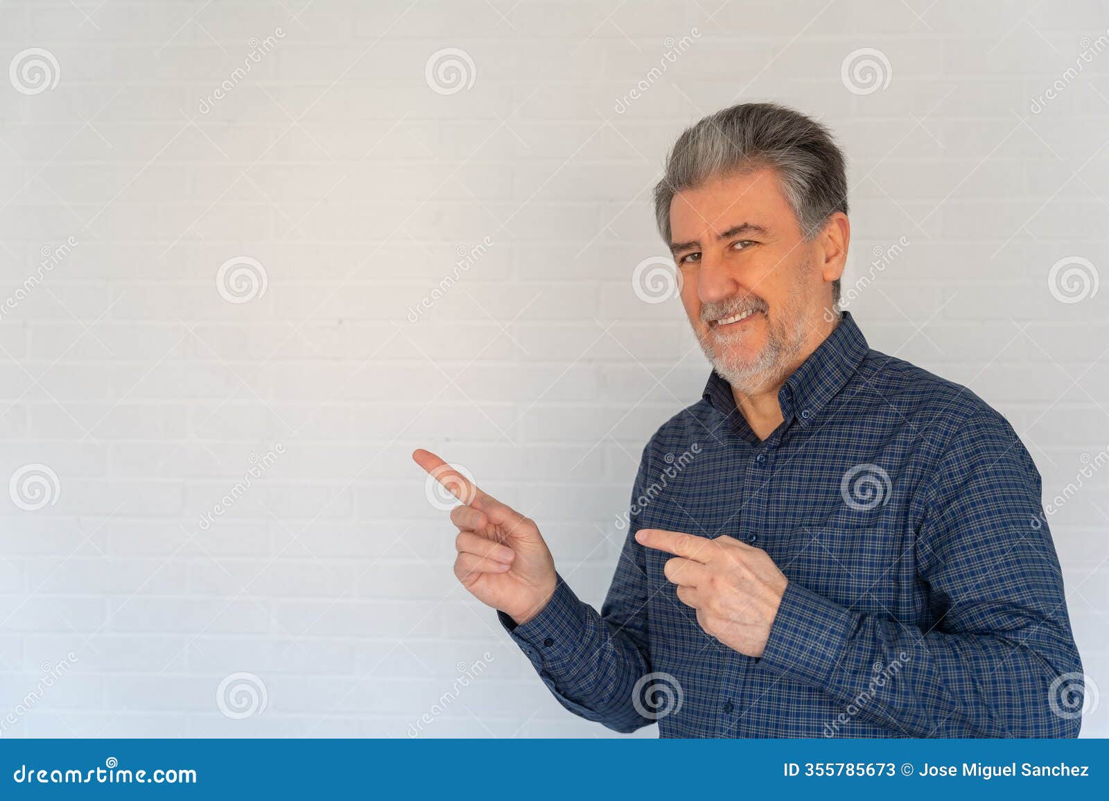 Senior White Man with Positive Attitude Pointing To Empty Space on a ...