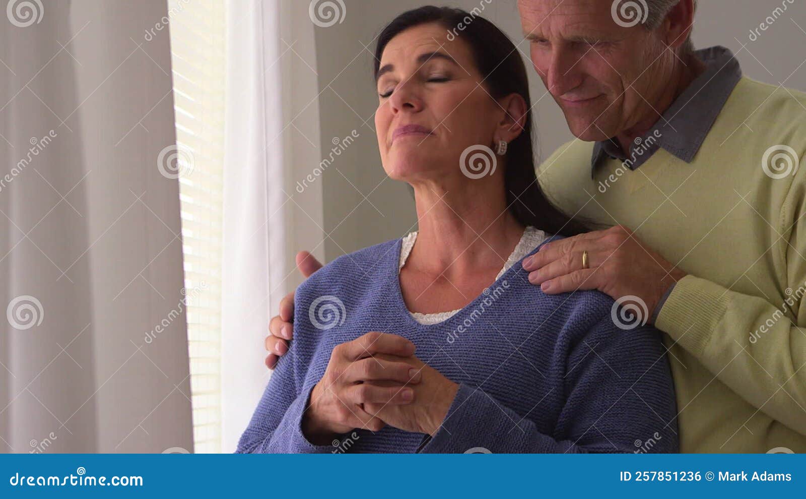 Senior Wife Grieving by Window with Husband Stock Footage - Video of ...