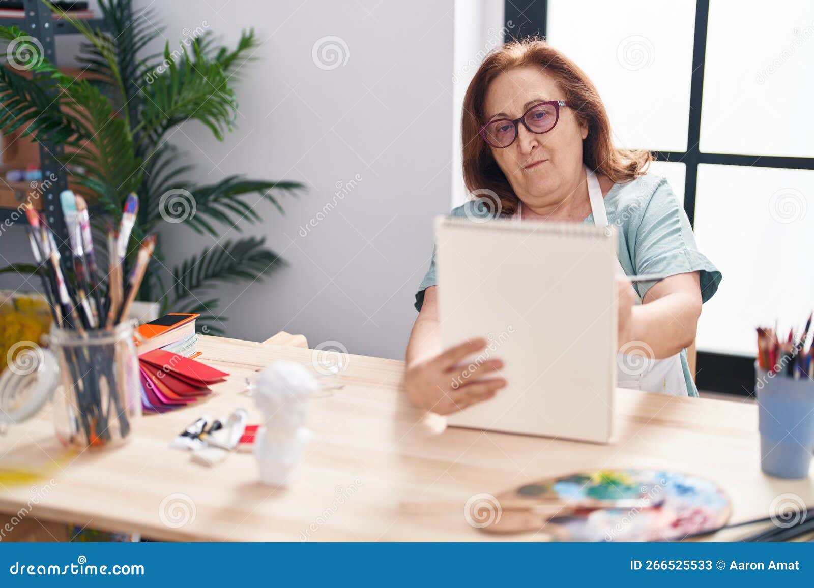 Senior Woman Artist Drawing on Notebook at Art Studio Stock Image ...